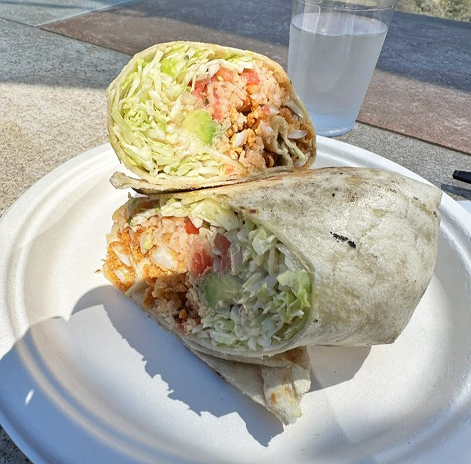 Not just a pretty face—this burrito means business, stuffed with seafood treasures and wrapped like a California sunset in a tortilla.