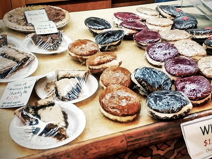 Whoopie pies lined up like edible jewels—each one a perfect sandwich of cake and cream waiting to ambush your diet plans.