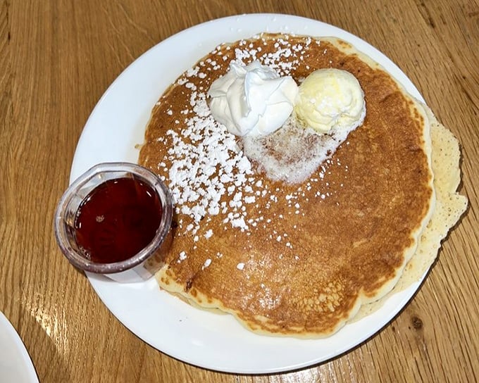 Golden-brown perfection with a dusting of powdered sugar—this pancake doesn't need a passport to transport you to breakfast nirvana.