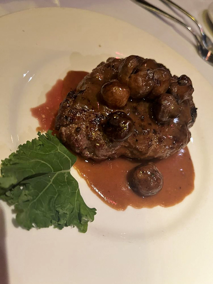 This sirloin isn't just a steak – it's a masterpiece with mushrooms that makes you wonder why anyone would ever order chicken.