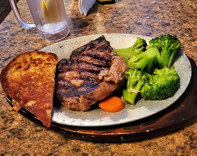 This isn't just a steak; it's a masterclass in simplicity – perfectly charred exterior, tender interior, and vegetables that didn't come as an afterthought.