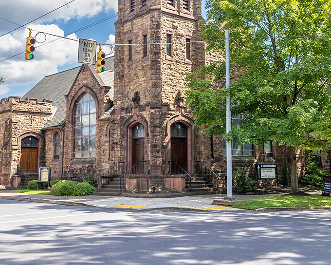 This magnificent stone church doesn't just reach toward heaven—it anchors the community with architectural gravitas and timeless beauty.