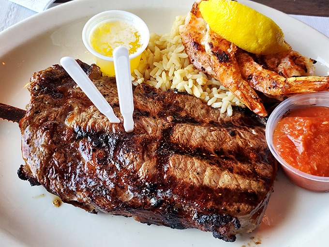 This steak doesn't just have grill marks; it has a personality. Paired with grilled shrimp and rice, it's the dinner equivalent of finding an extra $20 in your winter coat.