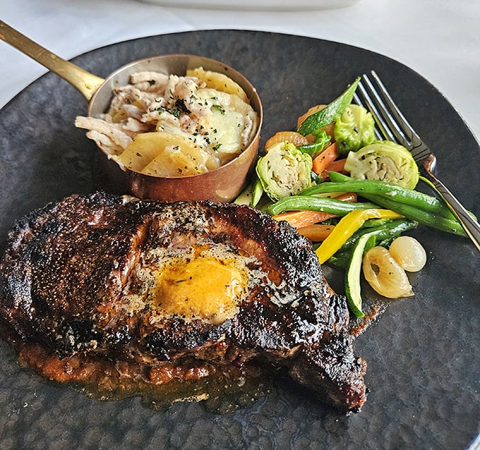 A steak that demands reverence – perfectly charred exterior giving way to a juicy interior, with sides that aren't merely afterthoughts but worthy companions.