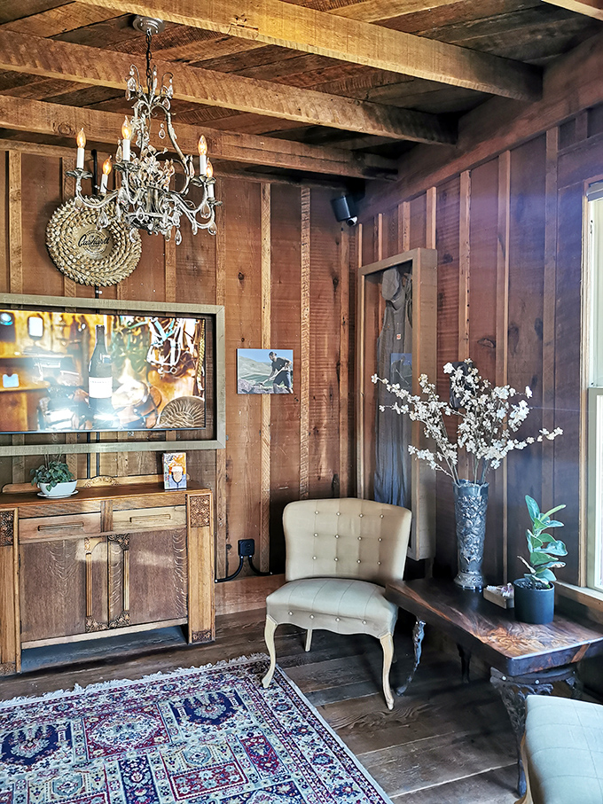 Exposed beams, crystal chandeliers, and wine-country warmth—this tasting room feels like the living room you wish you had.