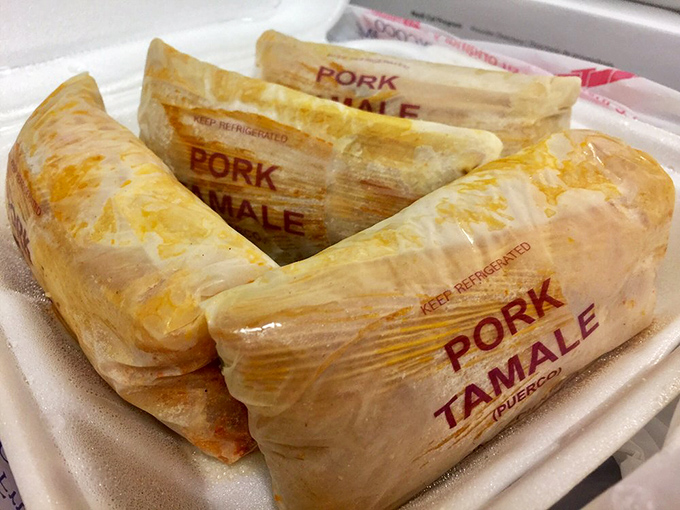 These aren't just tamales—they're edible time machines wrapped in corn husks, transporting you to a Mexican grandmother's kitchen with every bite.