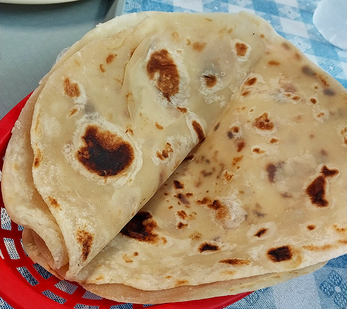 These aren't just tortillas; they're edible time machines to your grandmother's kitchen—if your grandmother happened to be a Mexican culinary genius.