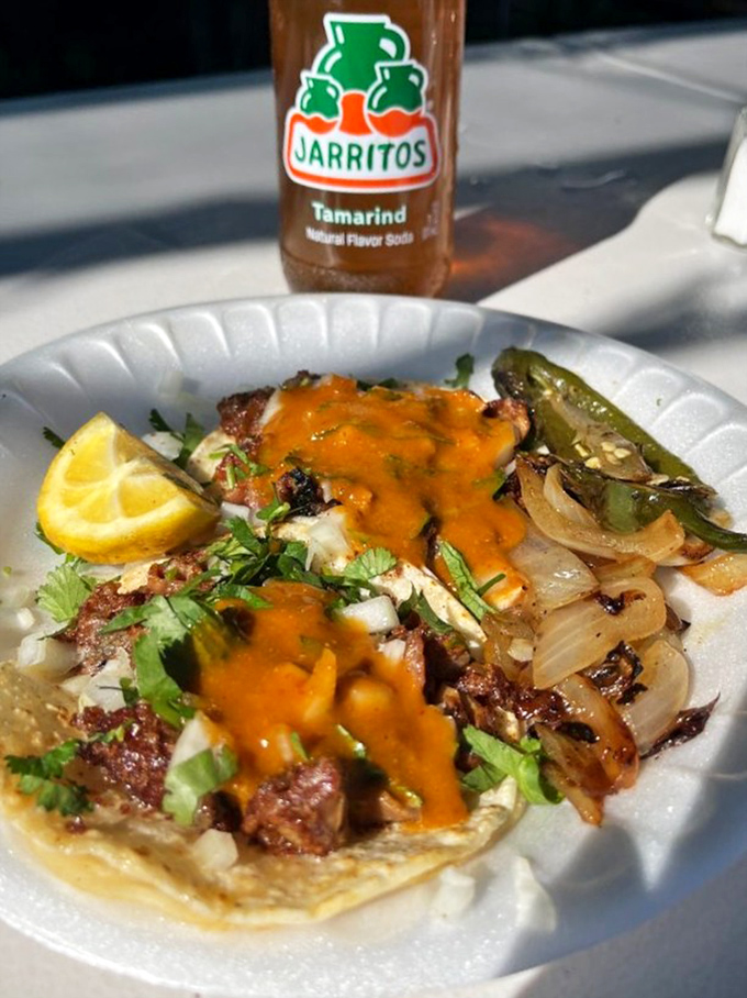 Taco perfection with a Jarritos chaser – the kind of authentic meal that makes you question why you ever ate at chain restaurants.