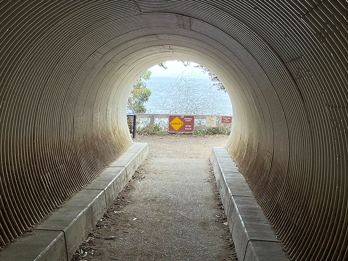 This unassuming tunnel is actually a portal to the Pacific, leading visitors from ordinary life to extraordinary views in about 15 steps.