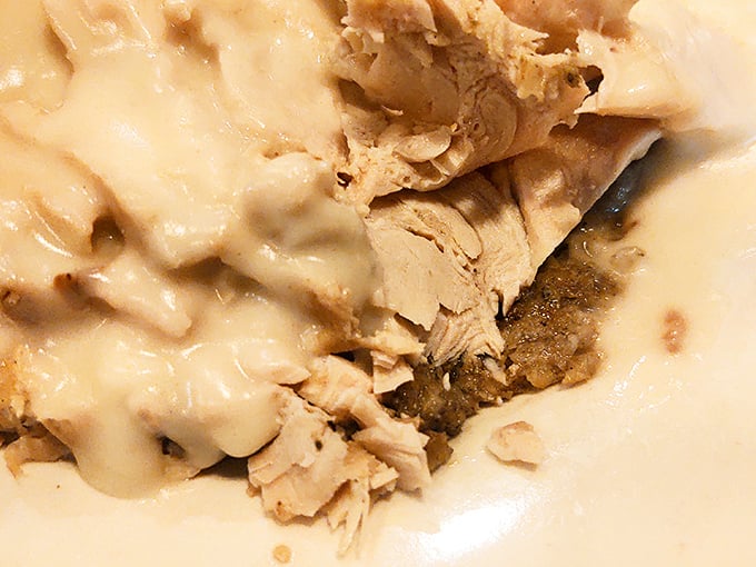 Turkey dinner that makes Thanksgiving jealous. This isn't just poultry – it's a masterclass in how gravy should cascade over perfectly tender meat.