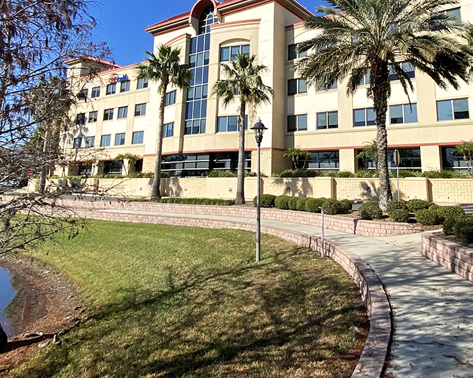 Modern healthcare facilities surrounded by palm trees – because even your doctor's visits should come with vacation vibes.