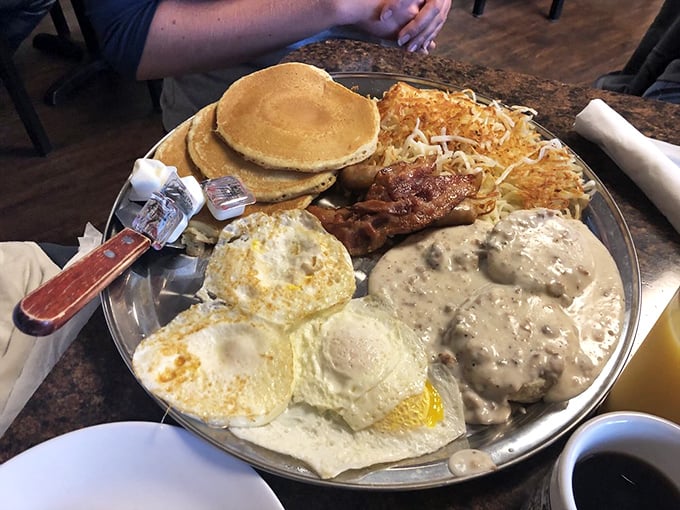 Behold the Ultimate Breakfast—a magnificent platter where eggs, pancakes, bacon, and gravy coexist in perfect harmony like the Beatles in their prime.