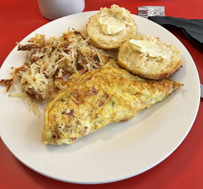 That Western omelette isn't just perfectly folded—it's a masterclass in egg architecture with hash browns that achieve the golden-crisp ideal.