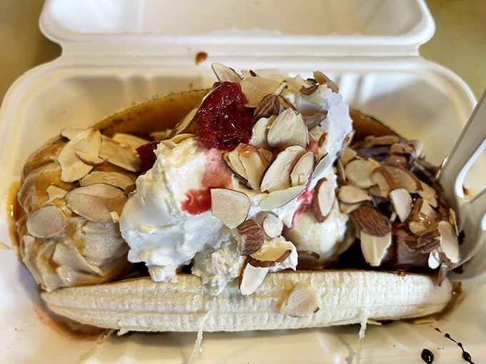 This banana split doesn't just satisfy a craving—it creates a memory. Those toasted almonds are the supporting actors in a blockbuster dessert.
