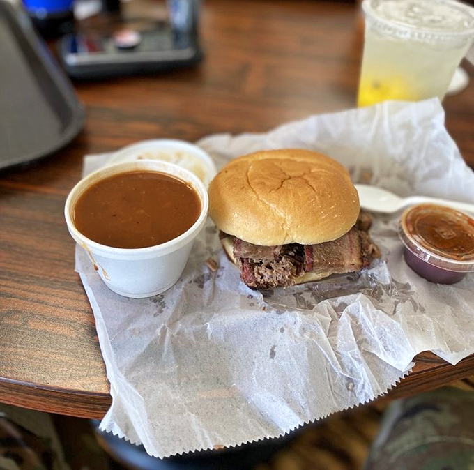 This brisket sandwich isn't just a meal—it's a religious experience with a side of salvation sauce.