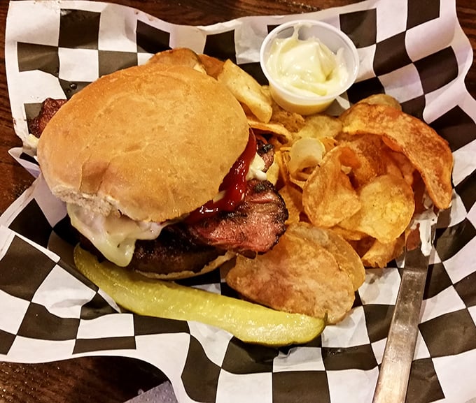 Not all heroes wear capes—some come on a checkered basket with house-made chips and a pickle spear standing guard.