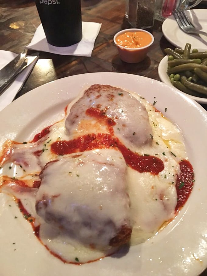 This isn't just chicken parmesan—it's a masterclass in Italian-American comfort. The cheese pull alone deserves its own Instagram account.