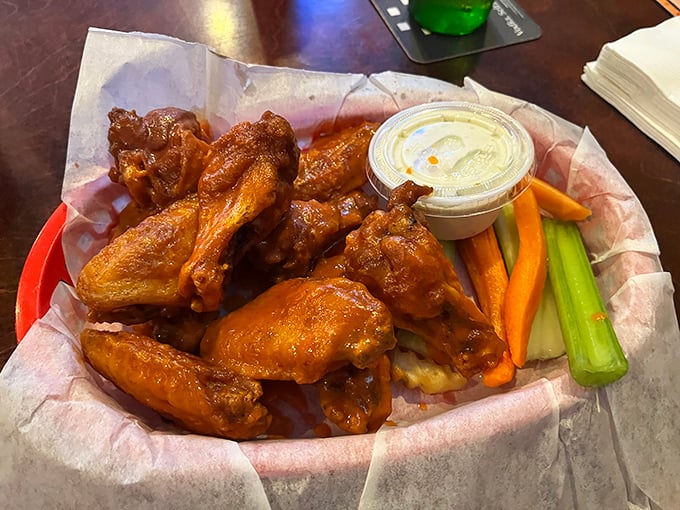 Wings that don't need a sports championship as an excuse to be devoured. Crispy, saucy perfection with cooling veggies on standby.