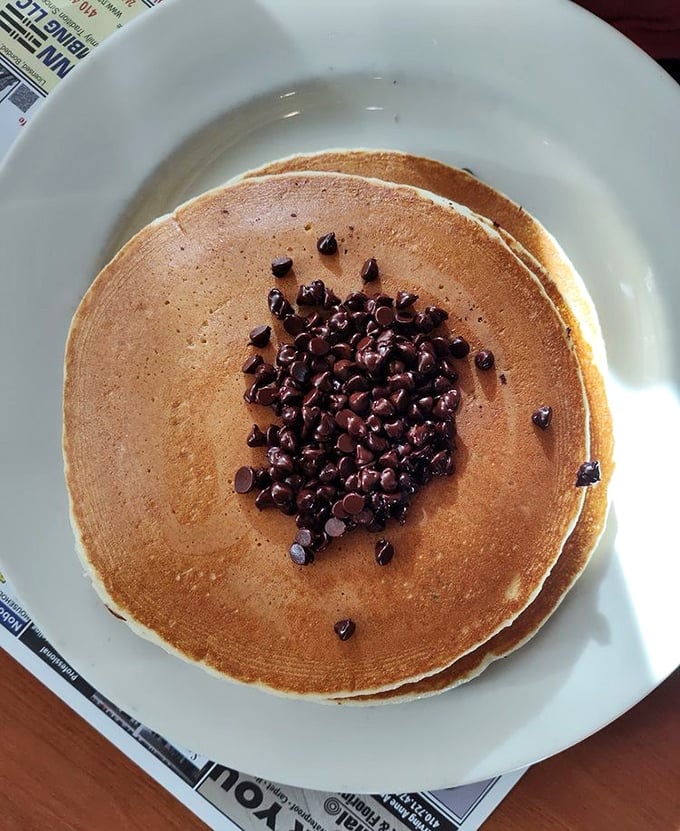 These chocolate chip pancakes aren't just breakfast—they're edible therapy with melty morsels arranged like a constellation of sweet possibility.