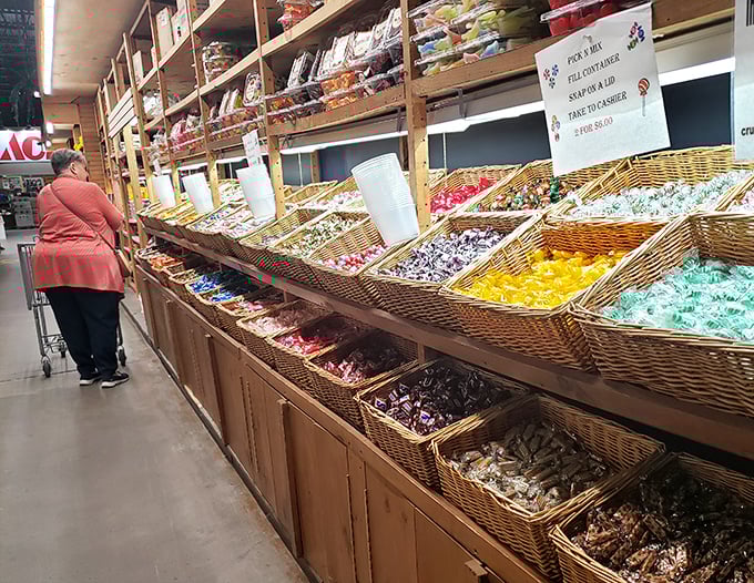 A candy lover's paradise awaits with wicker baskets overflowing with colorful treats. Diet resolutions come here to die a deliciously sweet death.