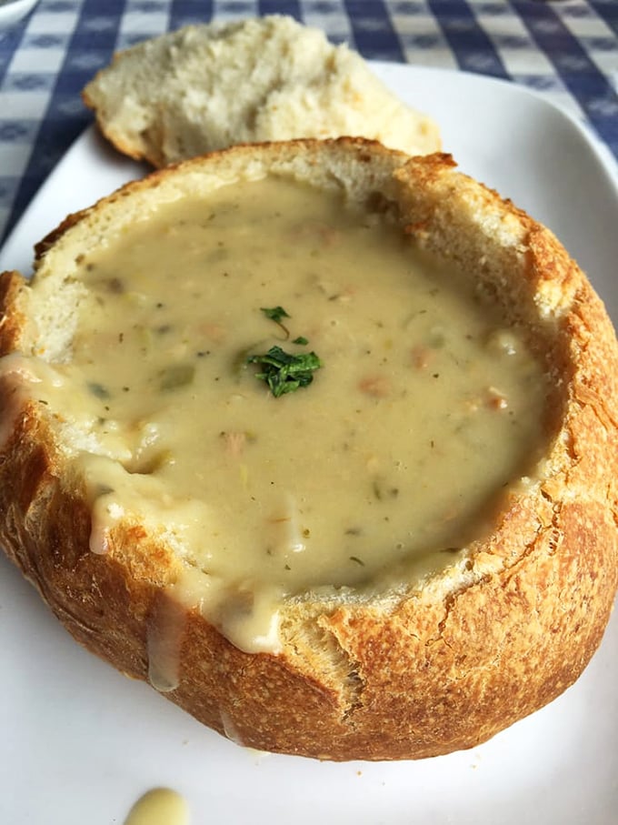 Bread bowls weren't invented for Instagram; they were created for this exact moment—when creamy clam chowder meets sourdough perfection.
