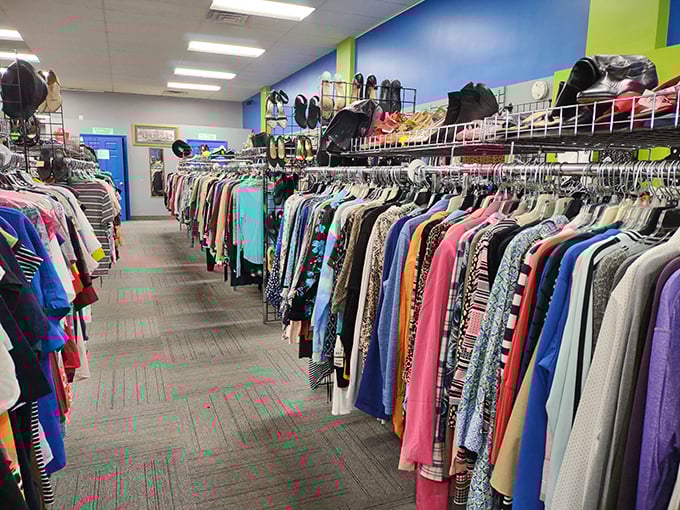 Clothing racks stretch toward the horizon like a textile rainbow. Each hanger holds not just garments, but stories waiting for new chapters.