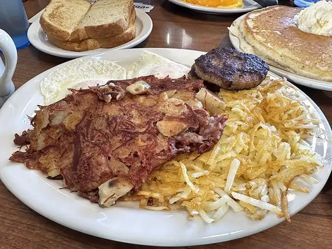 Breakfast of champions – crispy corned beef hash with eggs and golden hash browns that could fuel you through the apocalypse.