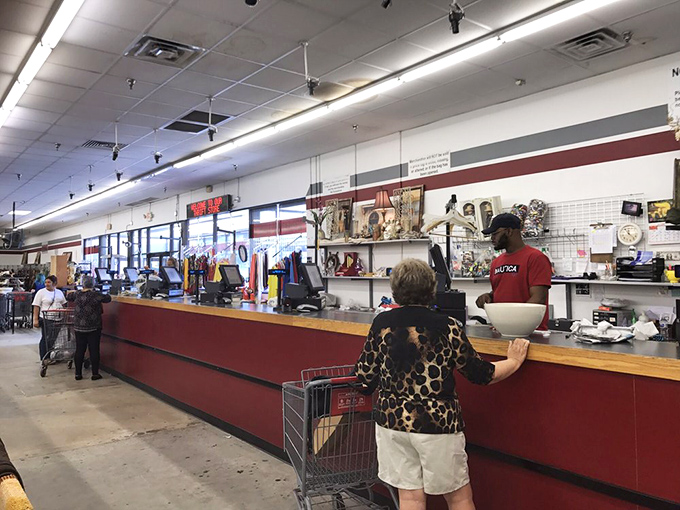 At the checkout counter, where bargain dreams become reality. The final tally always feels like you've somehow gotten away with something deliciously sneaky.