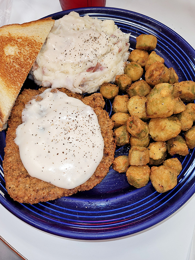 Country fried steak with gravy so good you'll want to write home about it—if you weren't too busy using your toast to soak up every last drop.