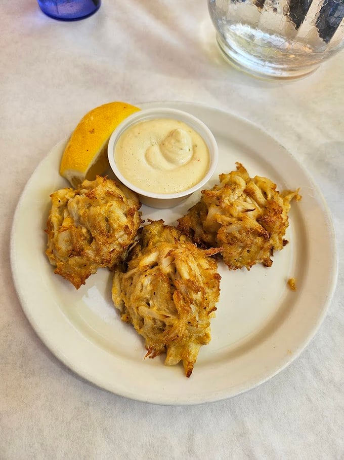 Golden-brown crab cakes that are all meat and no filler—the holy grail of seafood that makes you question every other crab cake you've ever eaten.