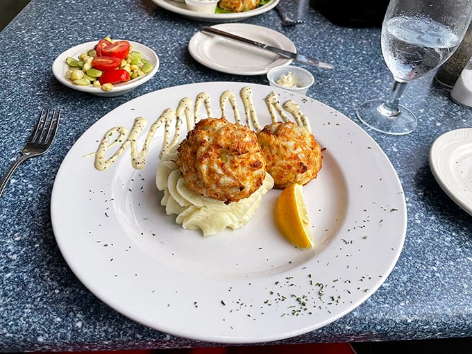 Behold the holy grail of Maryland cuisine—crab cakes that are almost entirely crab, with just enough binding to keep the lumps from floating away to heaven.