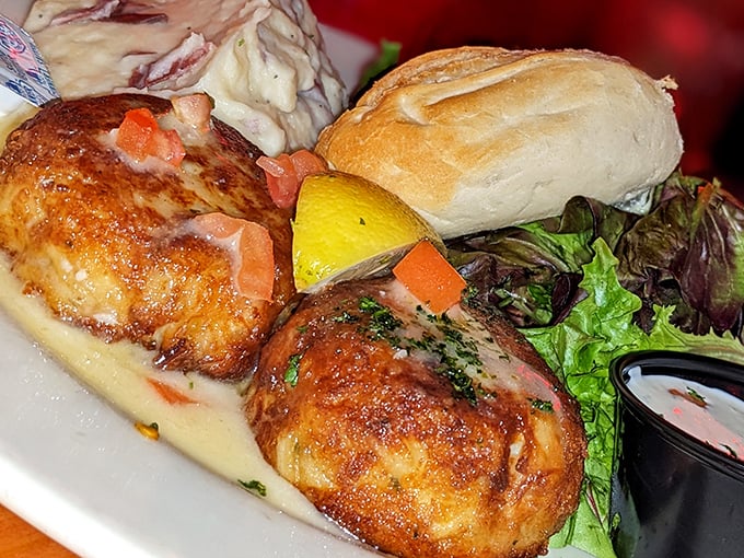 These aren't just crab cakes; they're edible gold medals. Perfectly golden-brown with barely enough filler to hold together the sweet, succulent crab meat.