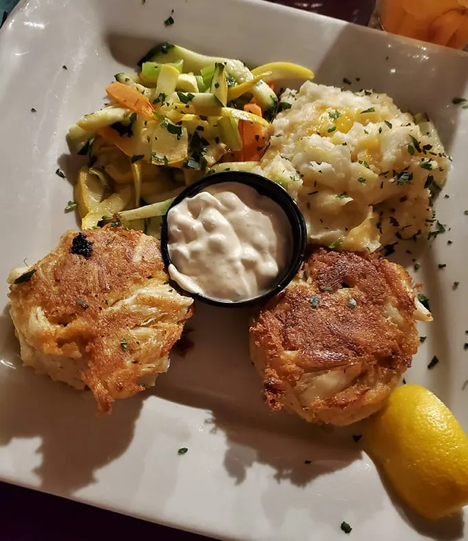 Golden-brown crab cakes that don't hide behind fillers—just pure, sweet lump crabmeat that makes you wonder why you ever settled for less.