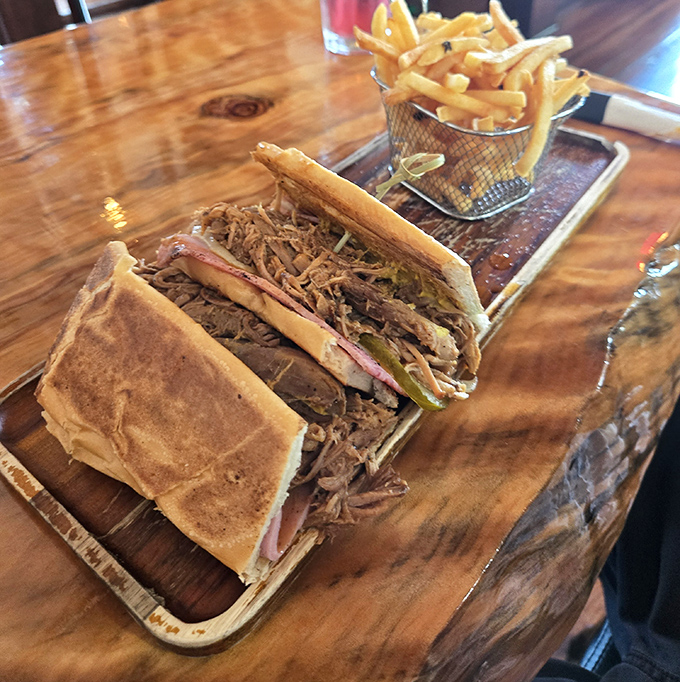 Not all heroes wear capes—some come pressed between bread with perfectly seasoned pork, ham, and pickles. This Cuban sandwich means business.