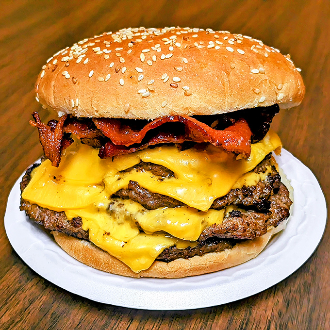 Not all heroes wear capes, but this double cheeseburger with bacon definitely deserves its own theme song and possibly a national holiday.