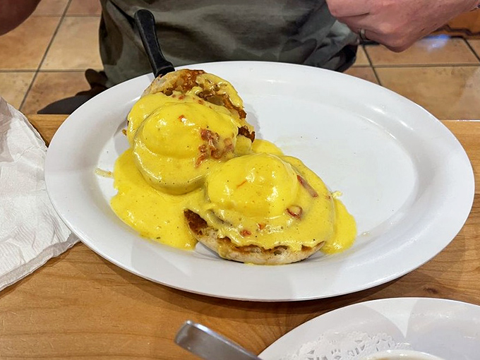 Eggs Benedict that would make the Pope jealous – golden hollandaise cascading down like a waterfall of breakfast bliss.