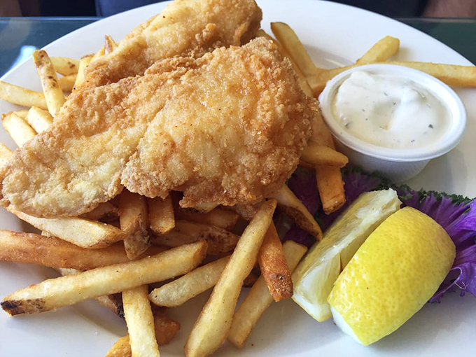 Golden-battered fish and chips that would make a British pub jealous. That tartar sauce isn't just a condiment—it's a revelation.