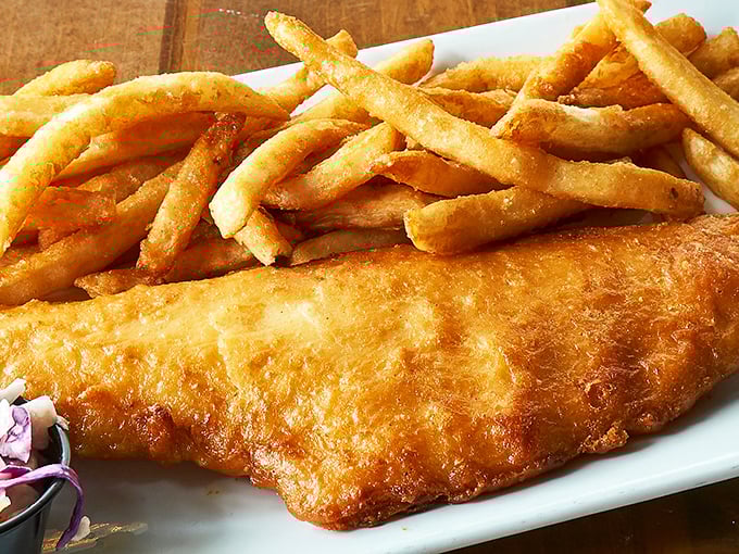 The star of the show: golden-battered fish with fries that achieve that mythical balance between crispy exterior and fluffy interior.