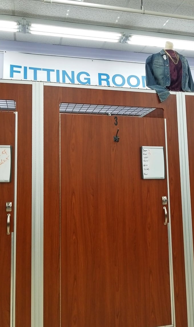 The fitting rooms—where fashion dreams are confirmed or denied. That denim jacket hanging above seems to whisper, "Try me on for size."