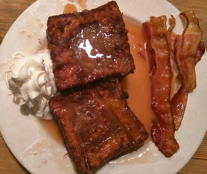 Behold the brioche French toast that's earned legendary status - thick, golden, and absolutely worth the pilgrimage to Charleston.