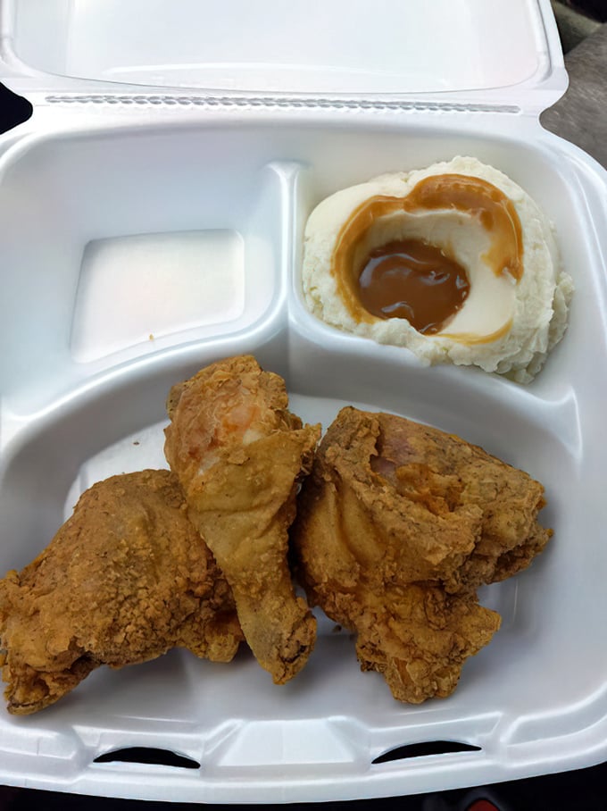 Golden-brown perfection meets cloud-like mashed potatoes. This isn't just fried chicken – it's edible Southern poetry.