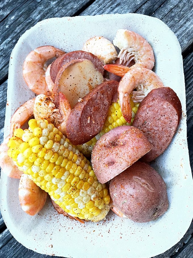 The legendary Frogmore Stew in all its glory—where plump shrimp, smoky sausage, sweet corn, and red potatoes throw the ultimate Lowcountry party.