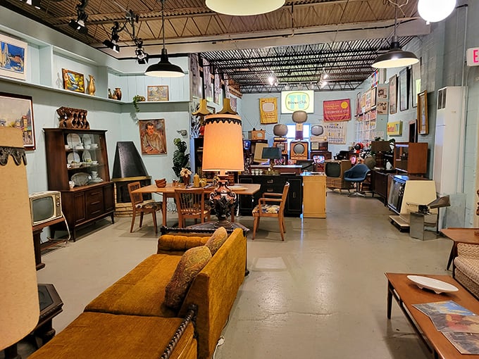 Mid-century modern heaven! This living room setup isn't just furniture—it's a time machine to when "Mad Men" wasn't a TV show but a career choice.