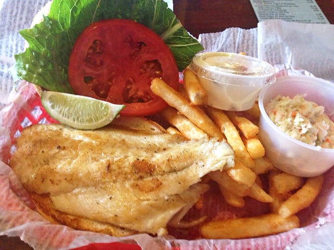 This grouper sandwich isn't just lunch – it's a masterclass in simplicity, where fresh fish, crispy fries, and Florida sunshine combine to create edible poetry.