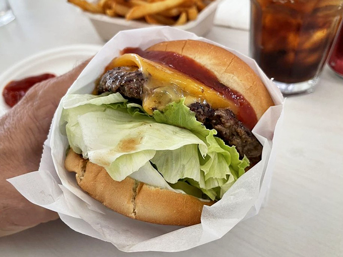 The legendary Hickoryburger arrives wrapped like a present – because it is one. That sauce should have its own star on the Walk of Fame.