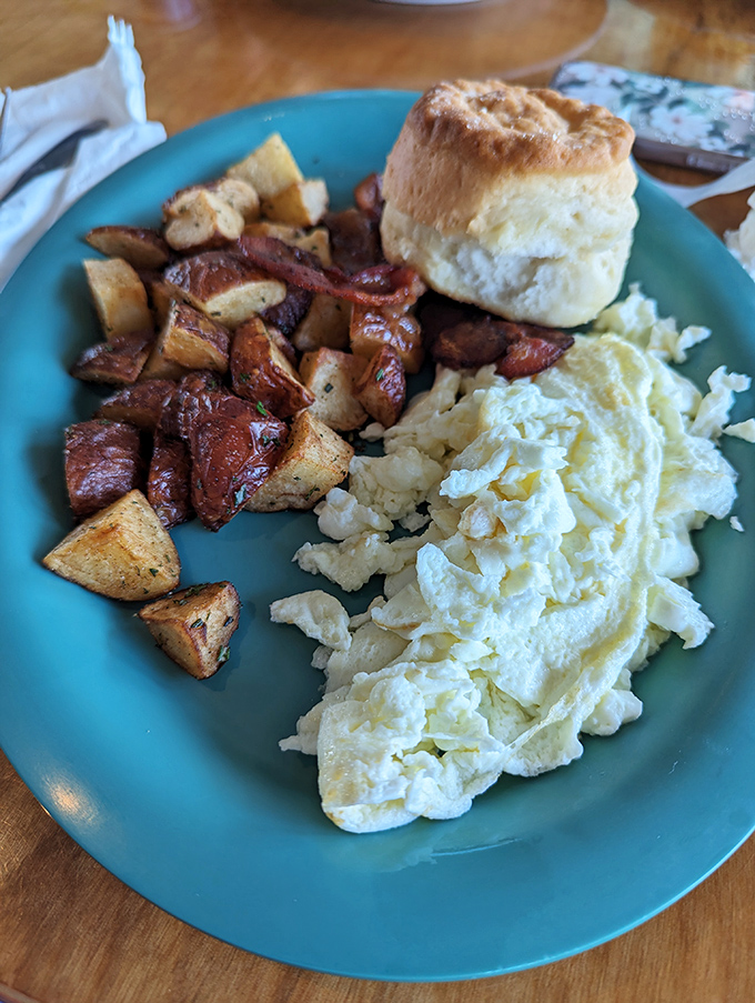 These home fries aren't just cooked, they're transformed—crispy exterior, fluffy interior, and seasoned with what can only be described as breakfast alchemy.