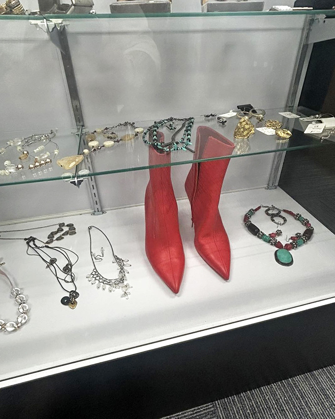 Red boots and vintage jewelry displayed like museum pieces—except here, you can actually take them home without setting off alarms.