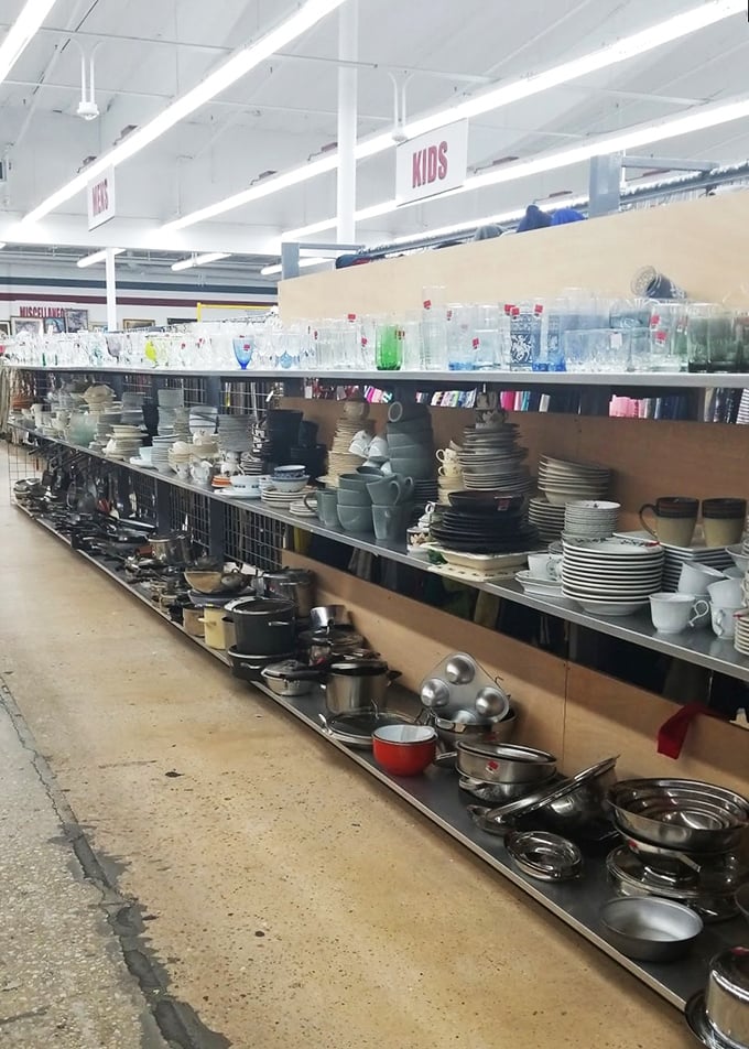 Kitchen dreams are made of these – rows of plates, glassware, and cookware waiting to find new homes and create future family meals.