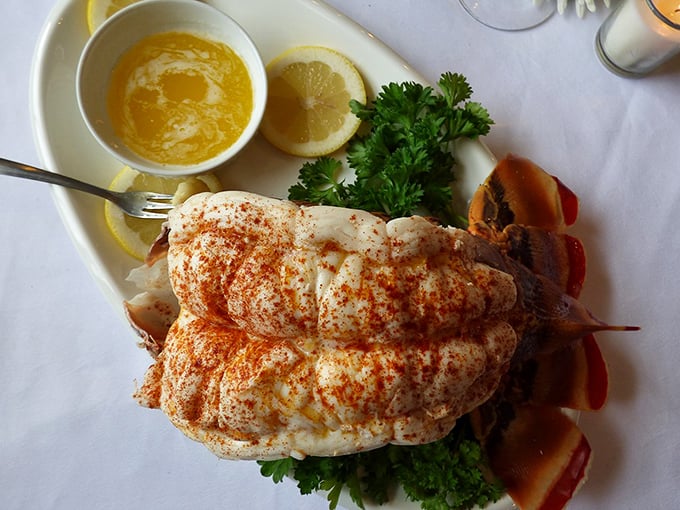 Lobster tail dressed for success! This crustacean masterpiece comes adorned with paprika and drawn butter—Neptune's finest in Wisconsin's heartland.