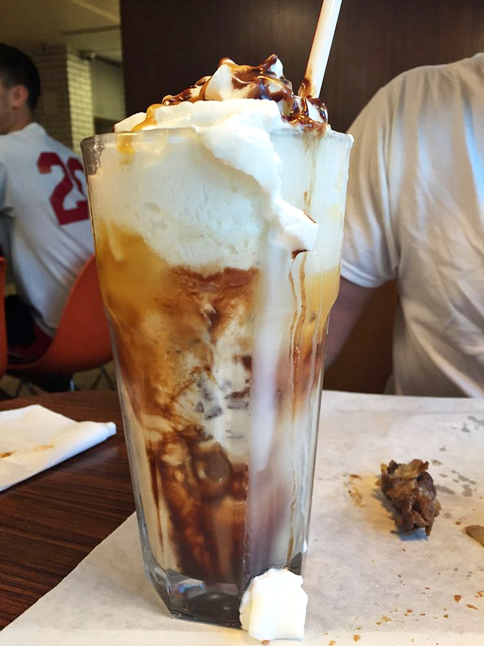 Not all heroes wear capes, but this caramel-drizzled milkshake definitely deserves its own theme music when it arrives at your table.